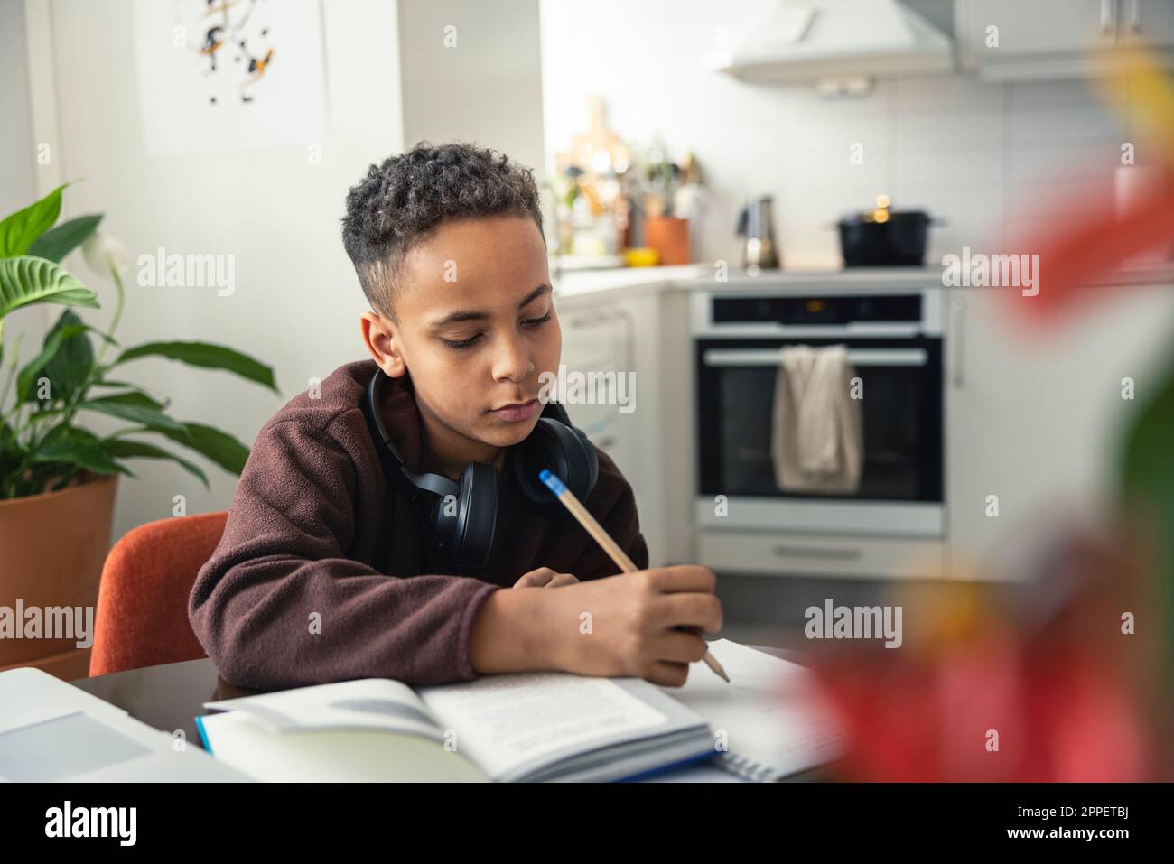 Schoolboy with brown hair hi-res stock photography and images - Alamy