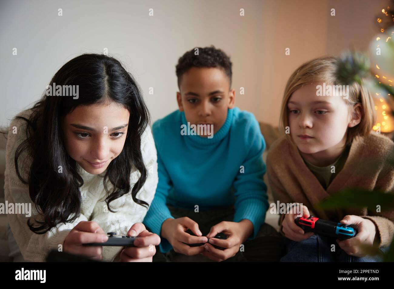 Children playing video games at home Stock Photo - Alamy