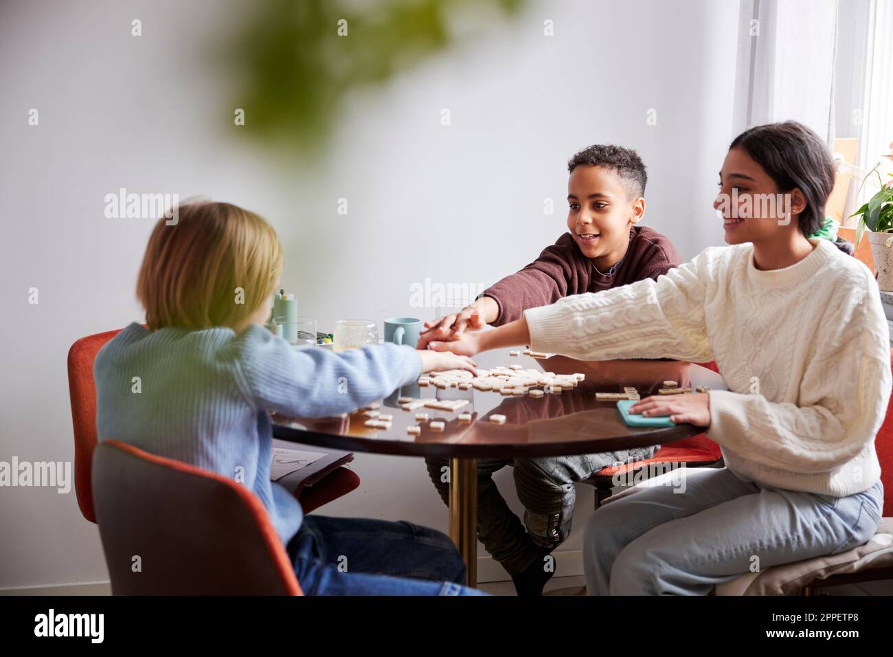 Playing scrabble hi-res stock photography and images - Alamy