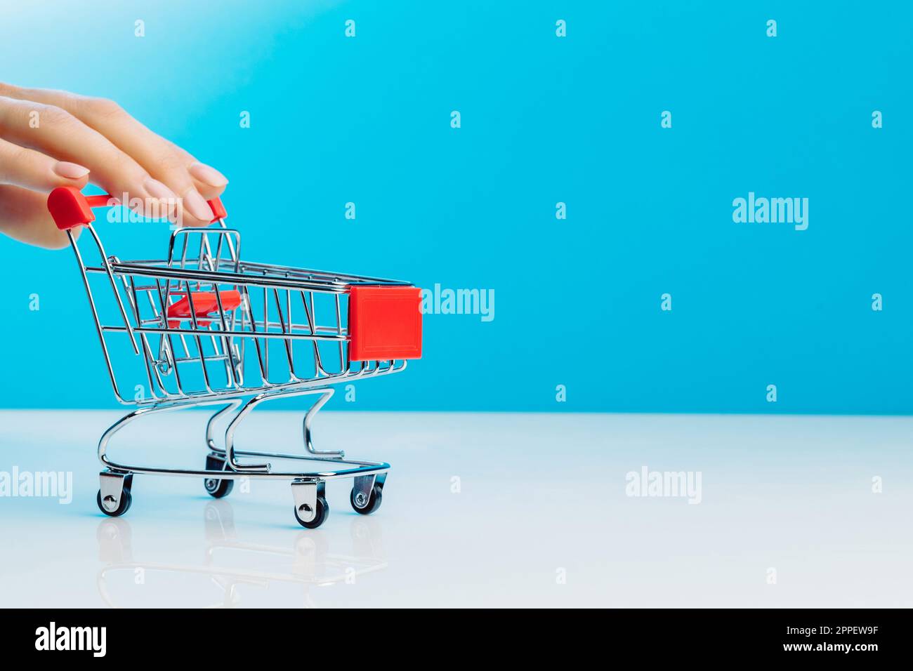 Business and e-commerce concept. Close-up of hand using fingers pushing ...