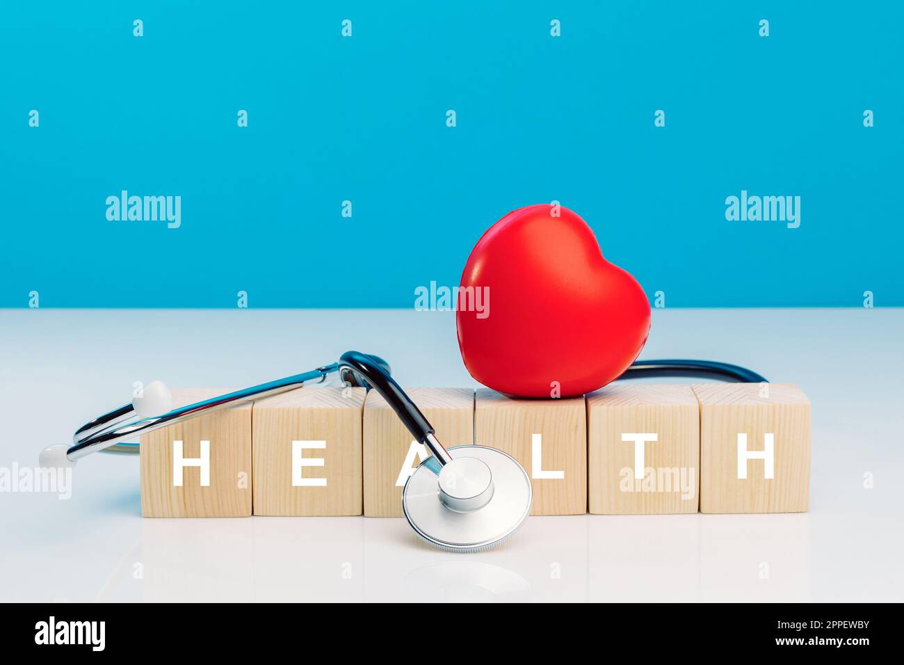 Diagnosis cardiologist concept. Text health on wooden cube blocks with ...