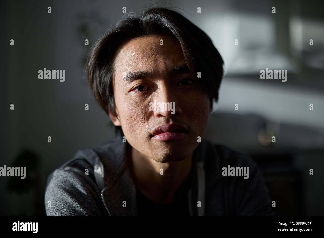 Portrait of crying man Stock Photo - Alamy