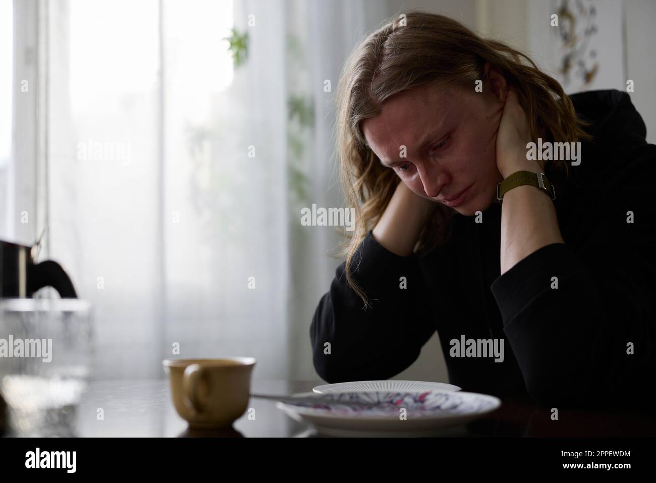 Depressed mature woman table hi-res stock photography and images - Alamy