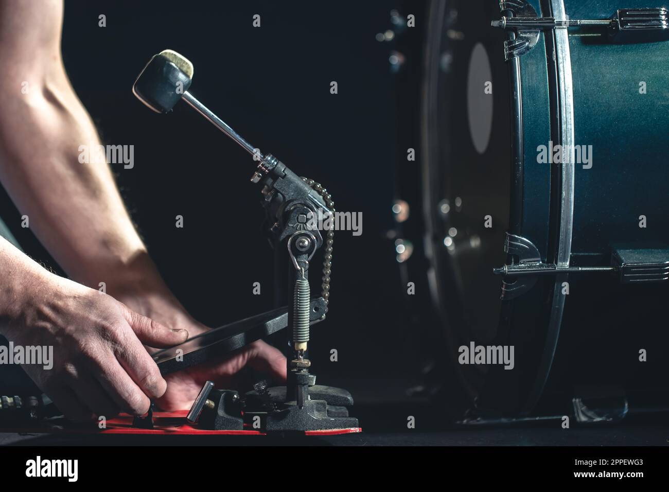 Bass drum and drummer, musical instrument on black background Stock ...
