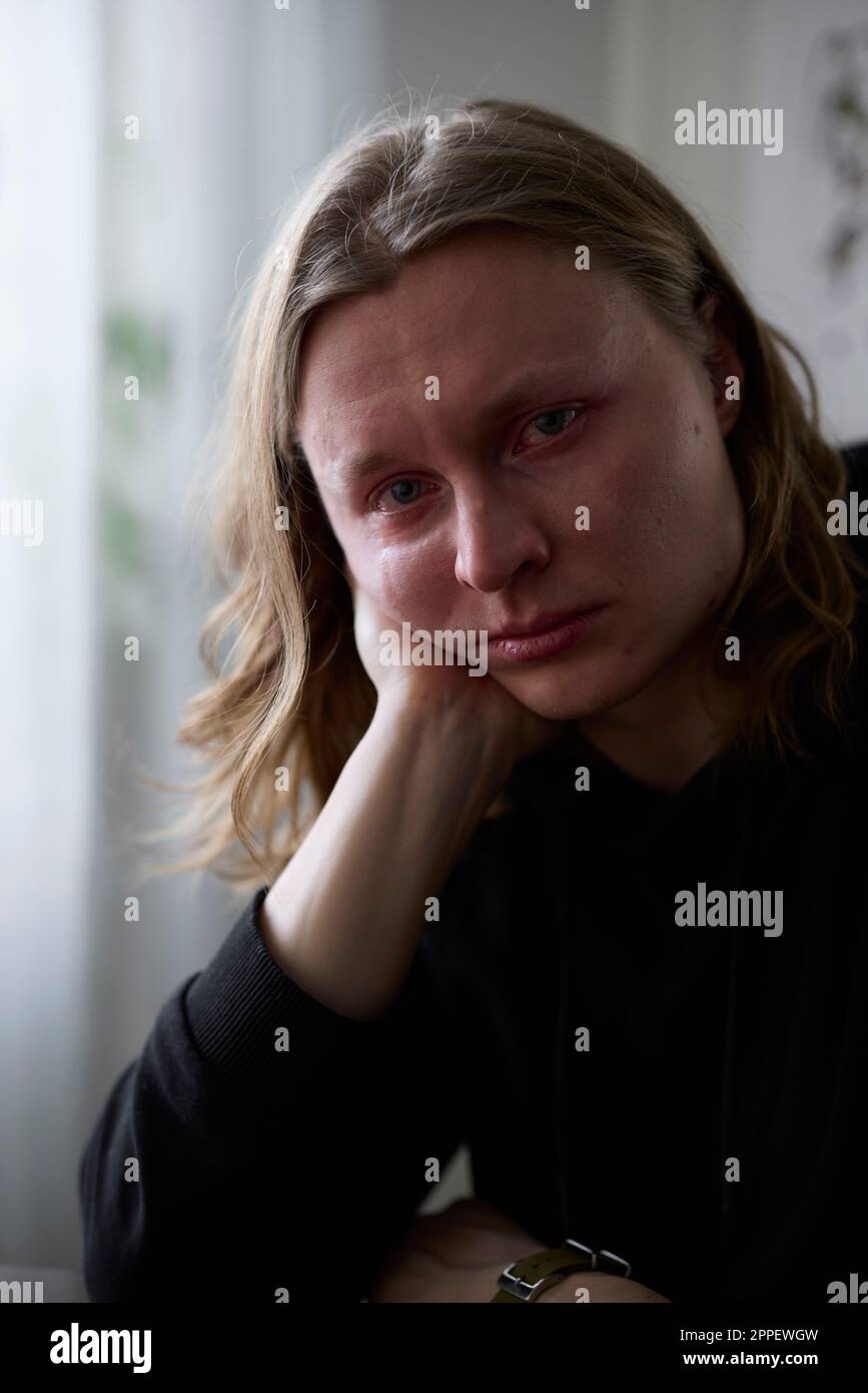 Crying woman looking at camera hi-res stock photography and images - Alamy