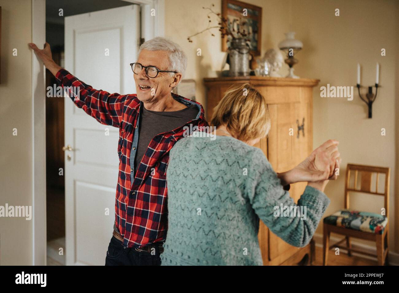 Senior couple dancing at home Stock Photo - Alamy