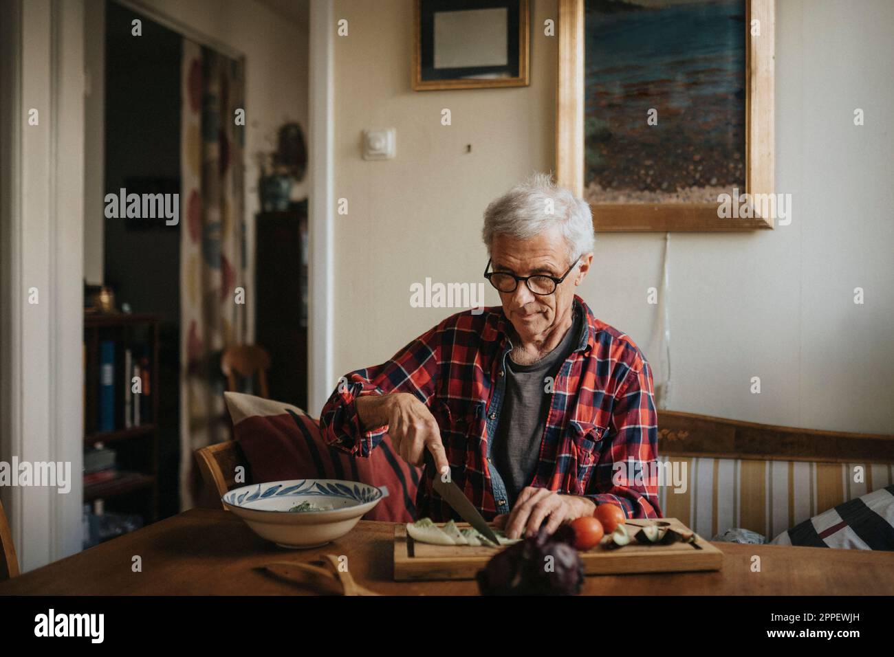 Old man preparing food hi-res stock photography and images - Alamy