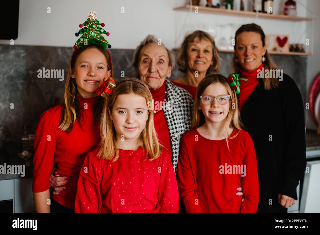 Christmas portrait of three-generations of females Stock Photo - Alamy