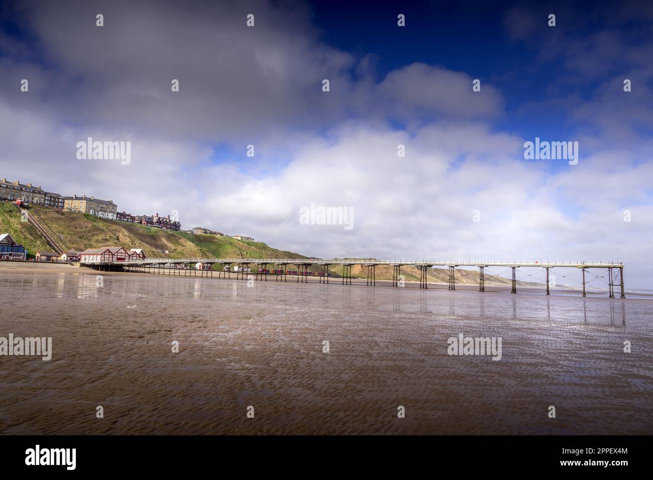The Victorian pier at Saltburn which stretches out over the beach at ...