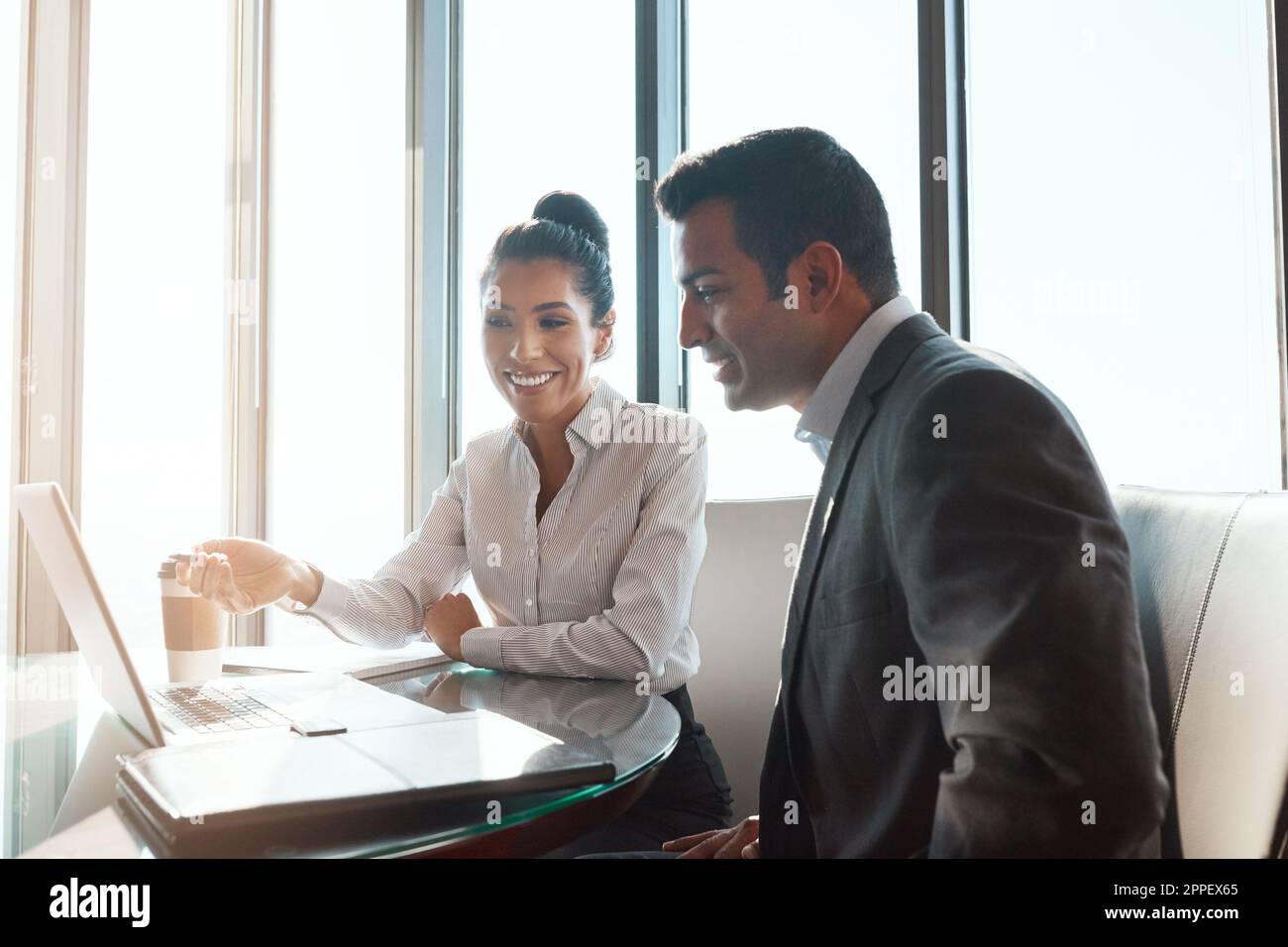 Its amazing to watch their business grow together. two businesspeople ...