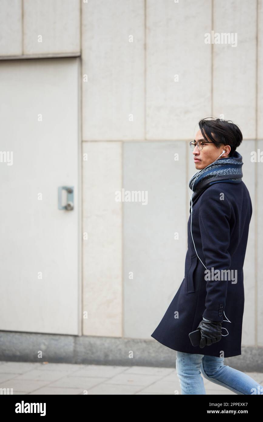 Man walking smart casual side hi-res stock photography and images - Alamy