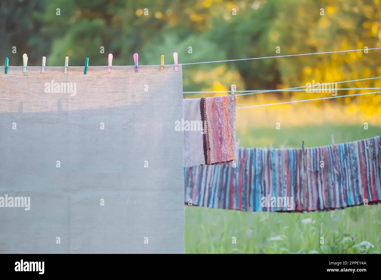 |Home textile drying on washing line outdoors Stock Photo - Alamy