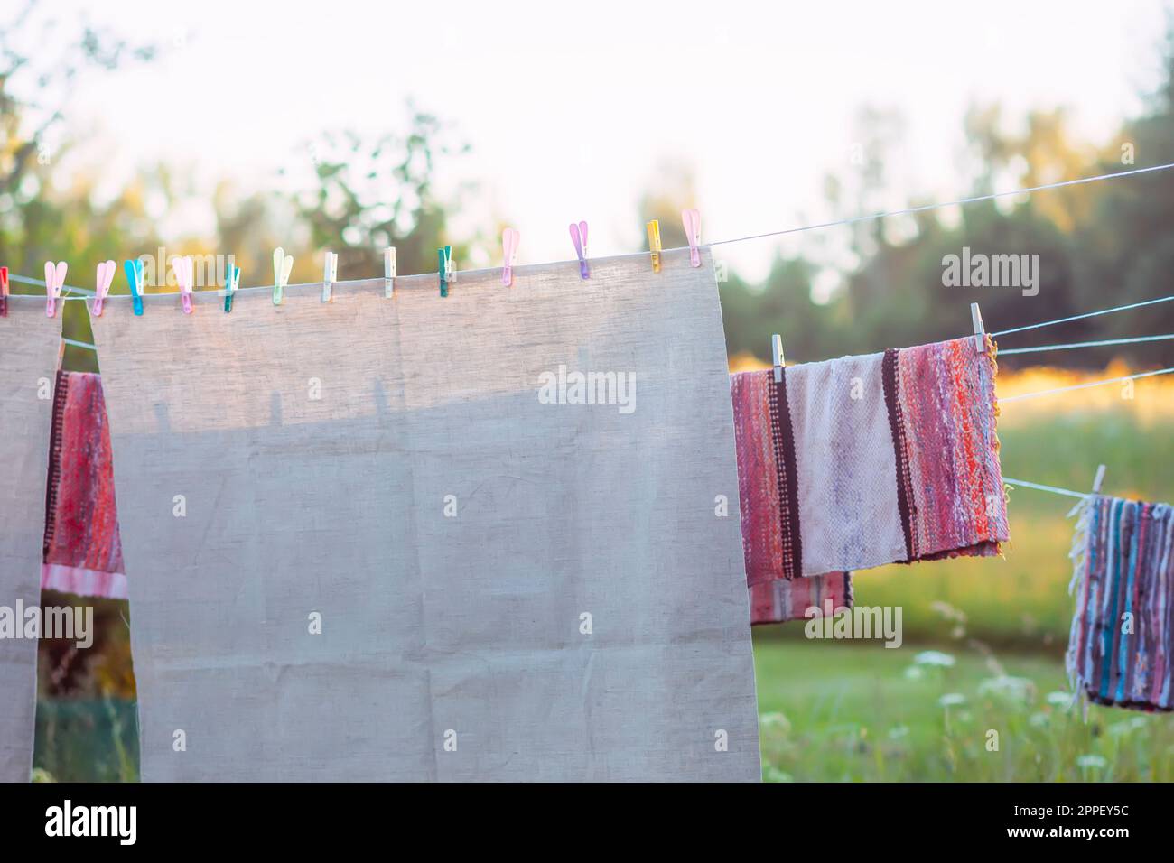 |Home textile drying on washing line outdoors Stock Photo - Alamy