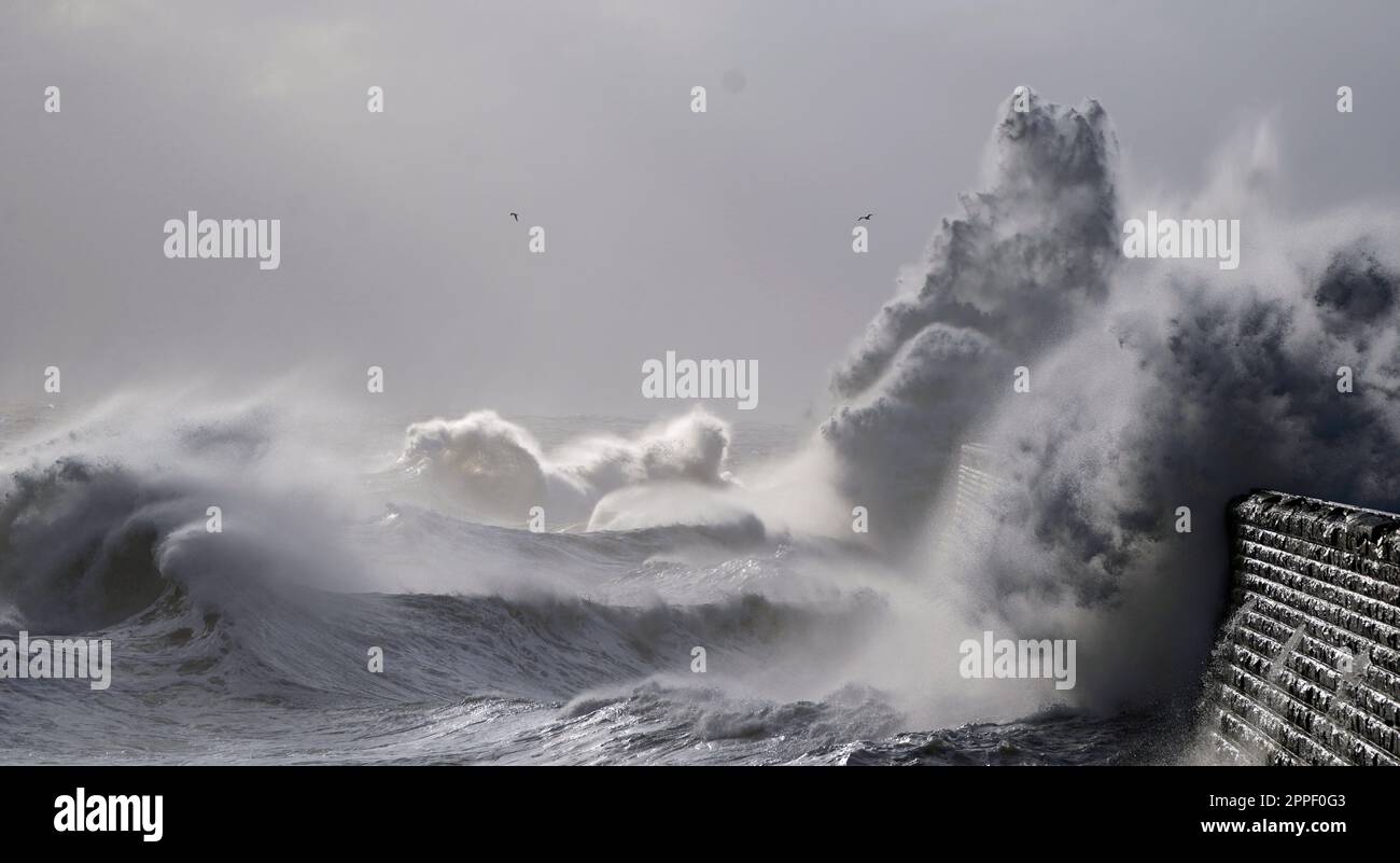 Waves crash over Tynemouth pier on the North East coast of England ...