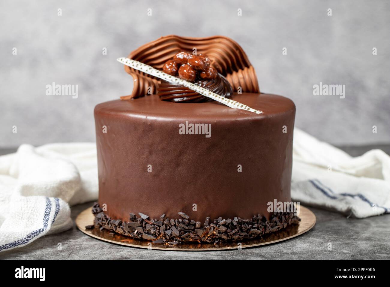 Chocolate cream cake. Chocolate birthday cake on dark background ...