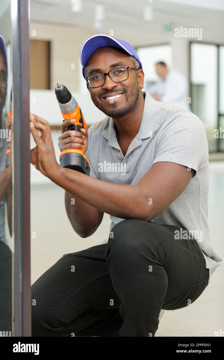 Making a hole hi-res stock photography and images - Alamy