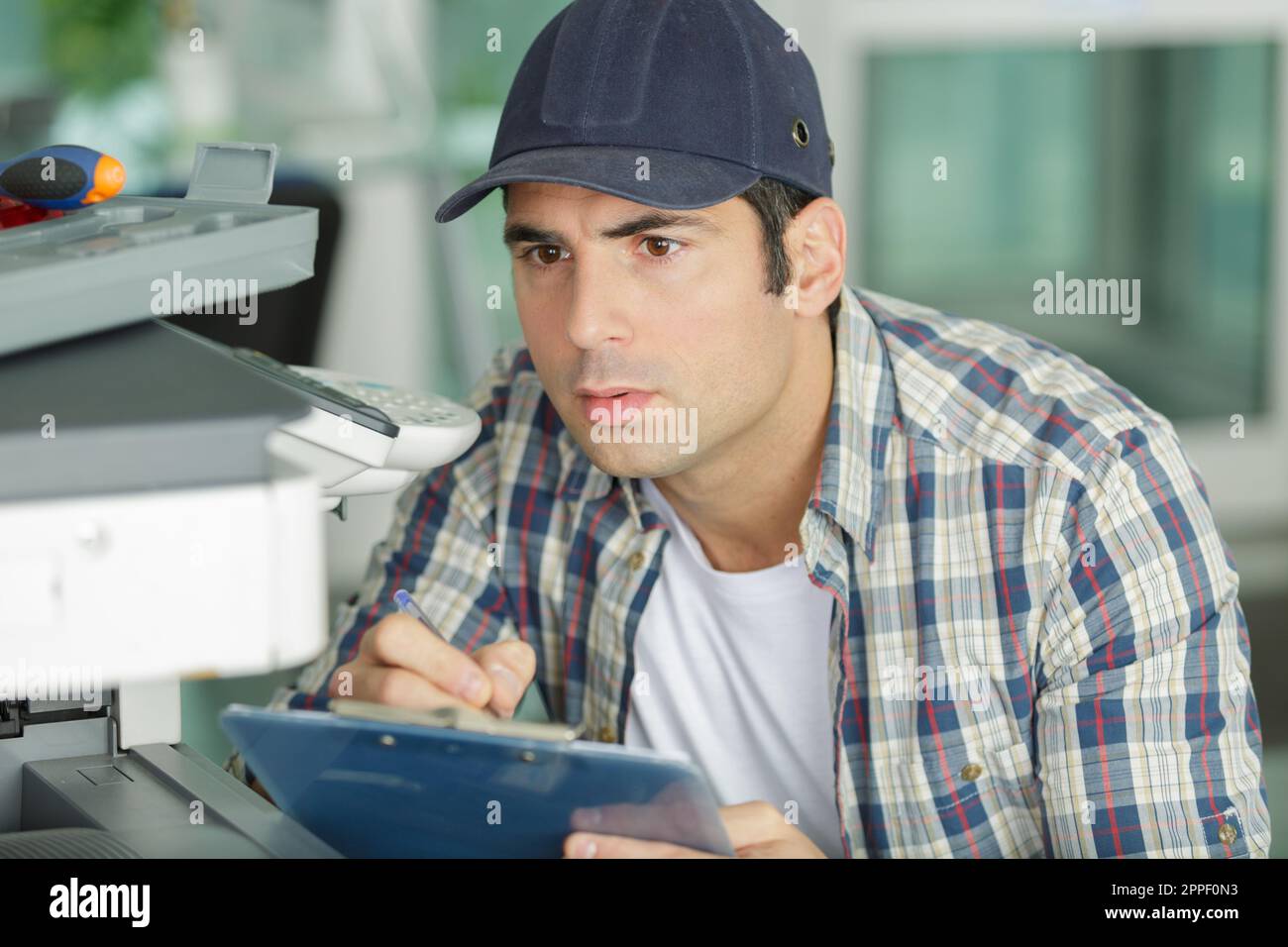 Printer checking print machine hi-res stock photography and images - Alamy