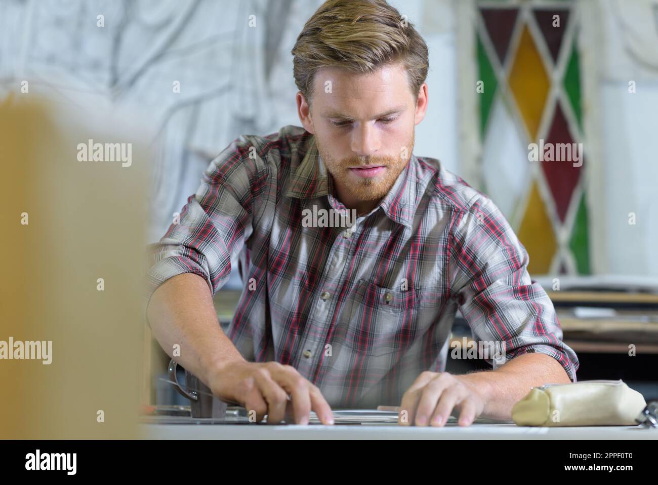 a constructor during drawing project Stock Photo - Alamy