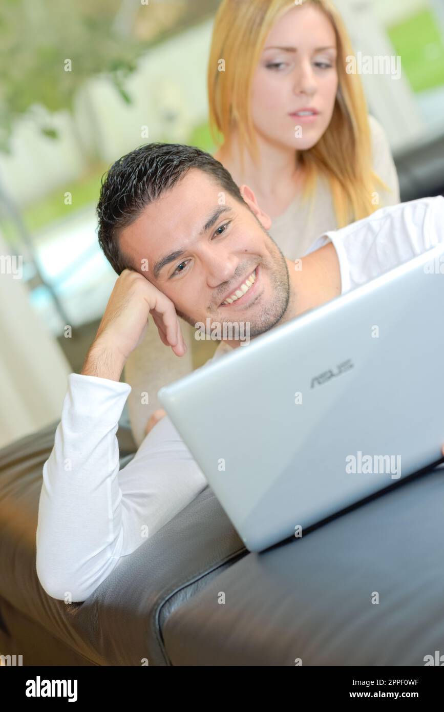 Suspicious woman and computer hi-res stock photography and images - Alamy