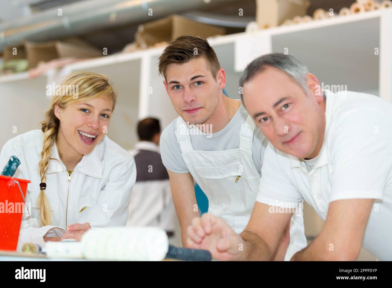 young apprentices painter in professional training Stock Photo - Alamy