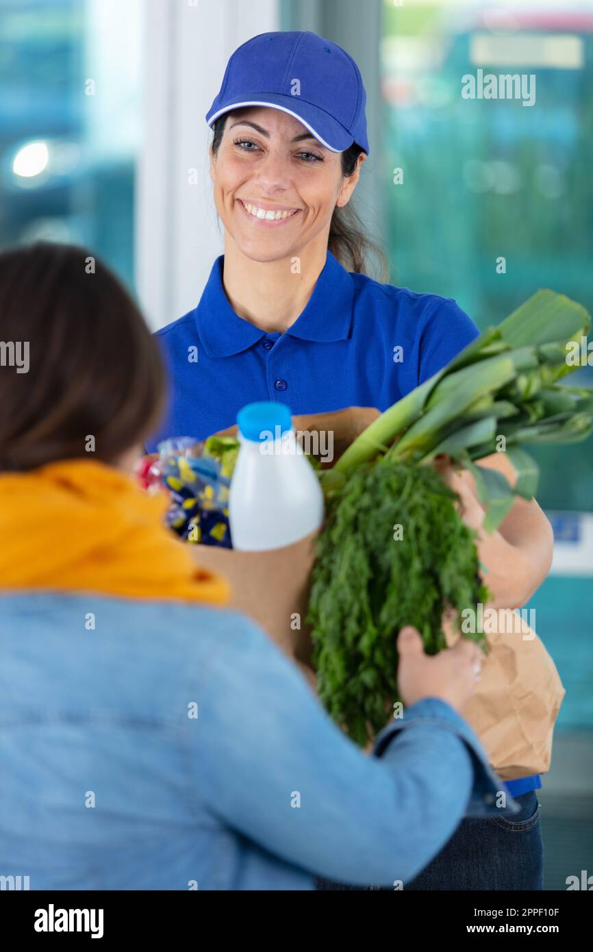 smart food delivery service man in uniform Stock Photo - Alamy