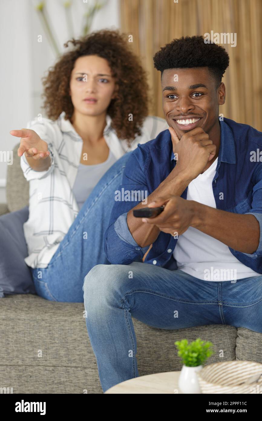 frustrated confused puzzled football fan with her boyfriend Stock Photo ...