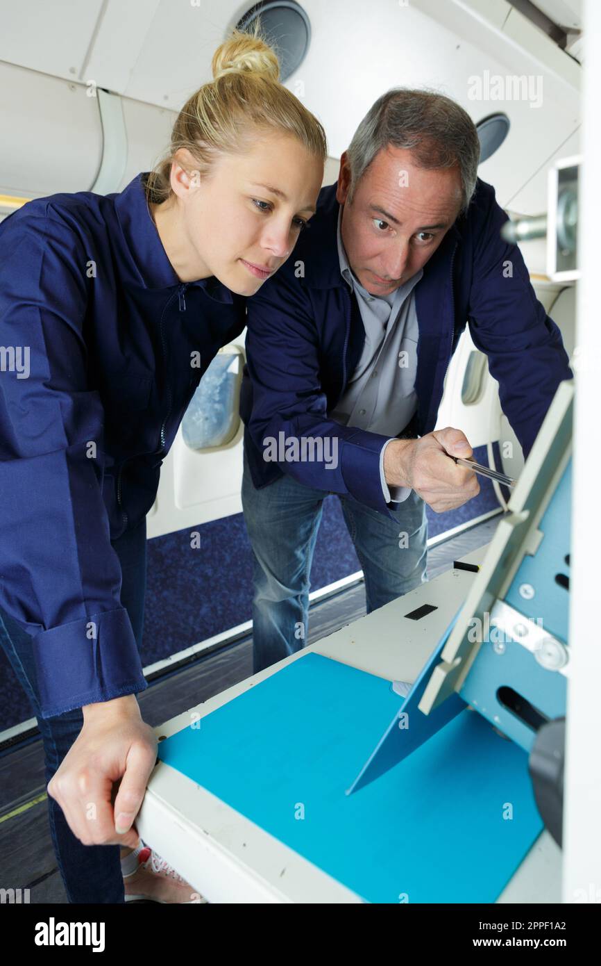 portrait of two modern aircraft engineers Stock Photo - Alamy