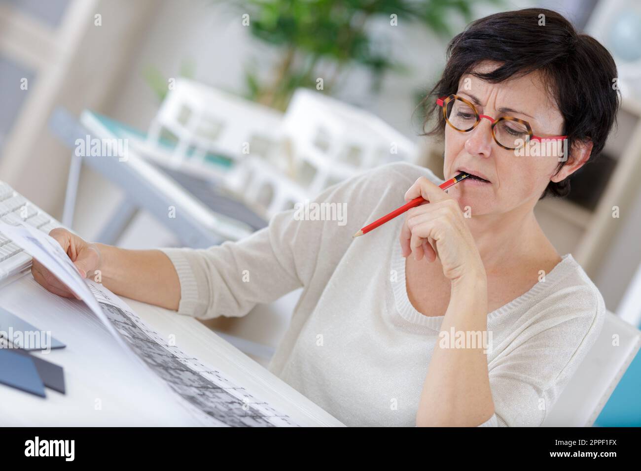 very busy architect working at home Stock Photo - Alamy