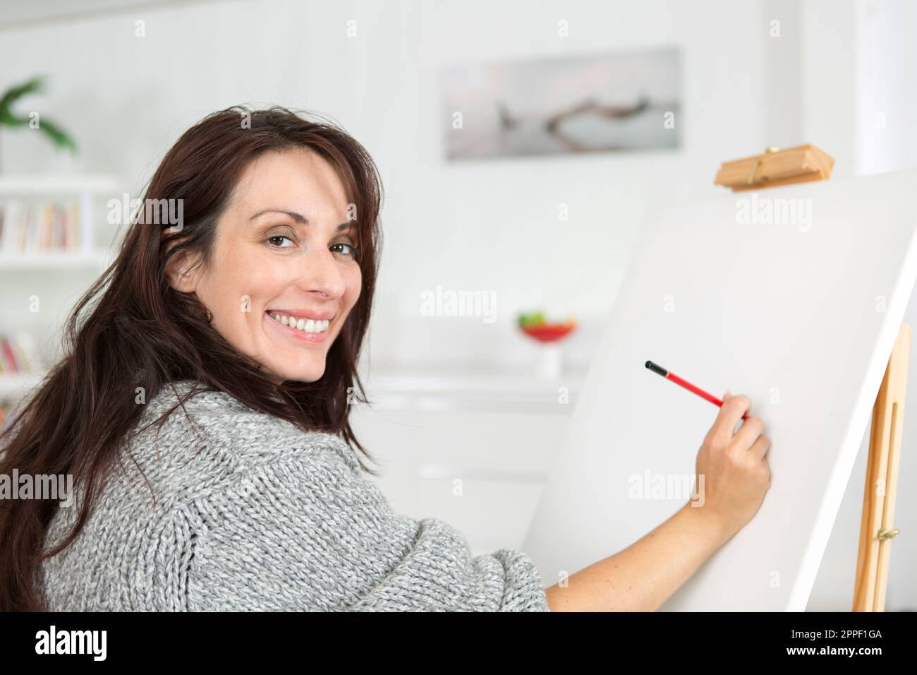 woman going to draw something Stock Photo - Alamy