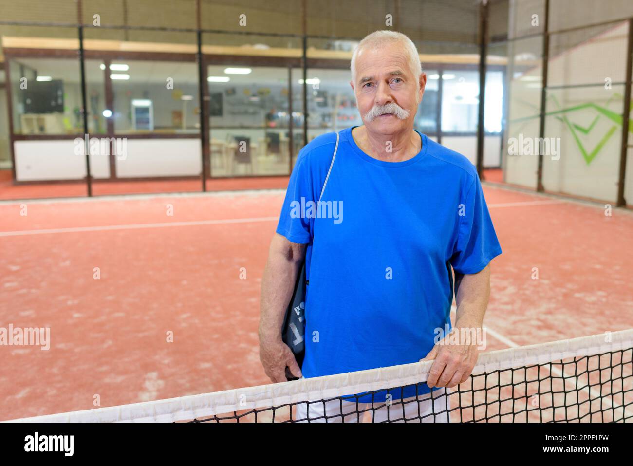 Old tennis player holding hi-res stock photography and images - Alamy
