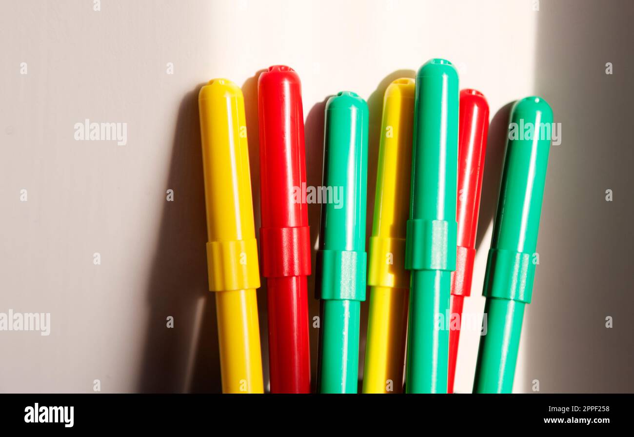 felt-tip pens in red green and yellow Stock Photo - Alamy