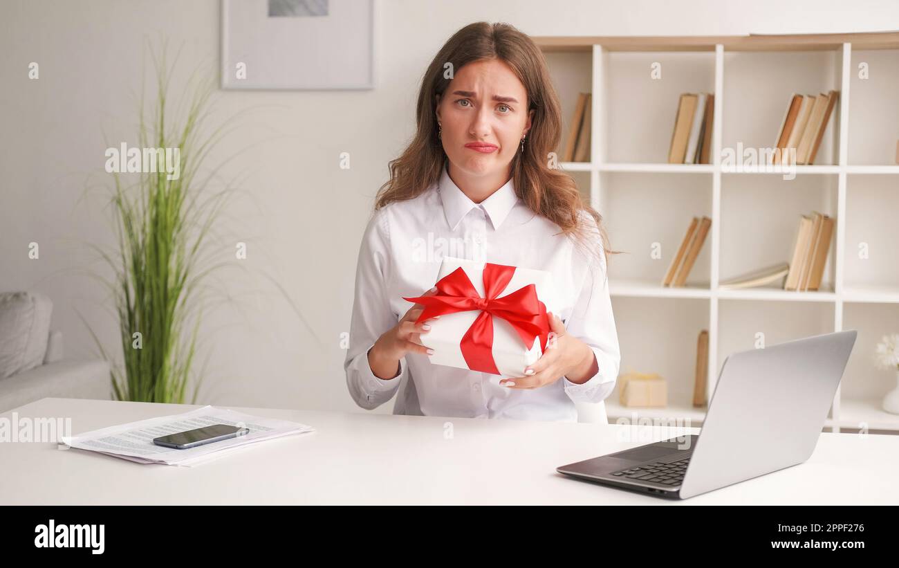 Woman present disappointed hi-res stock photography and images - Alamy
