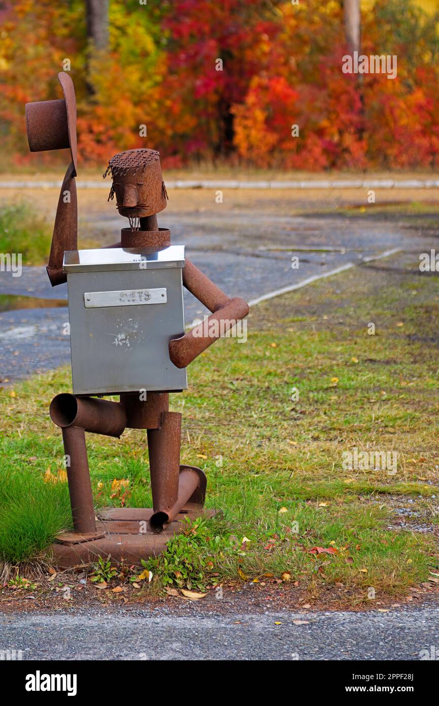 a different mailbox depicting old man with hat Stock Photo - Alamy