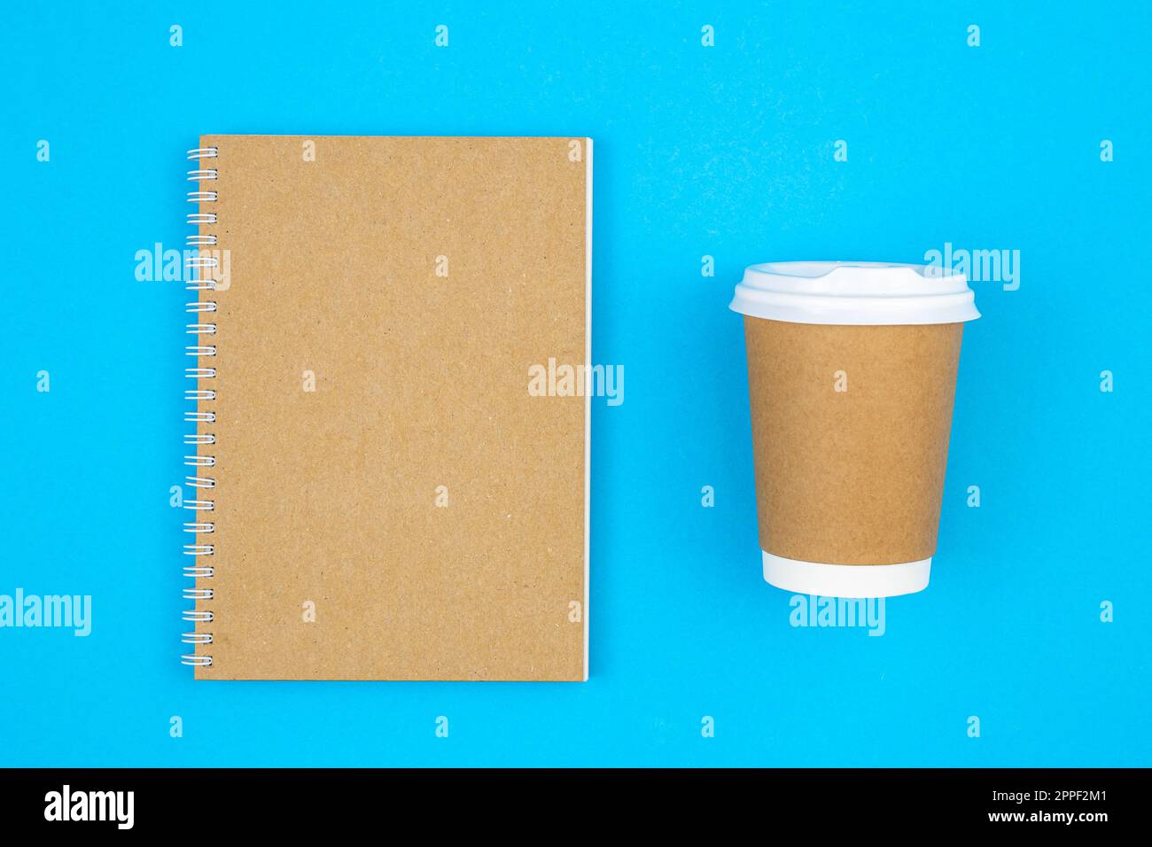 Paper disposable cup and notepad made from recycled paper cups, top ...