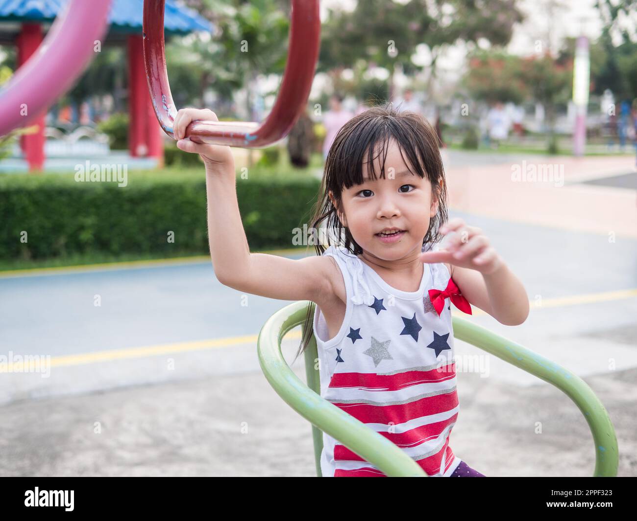 Happy asian baby child playing on playground Stock Photo - Alamy