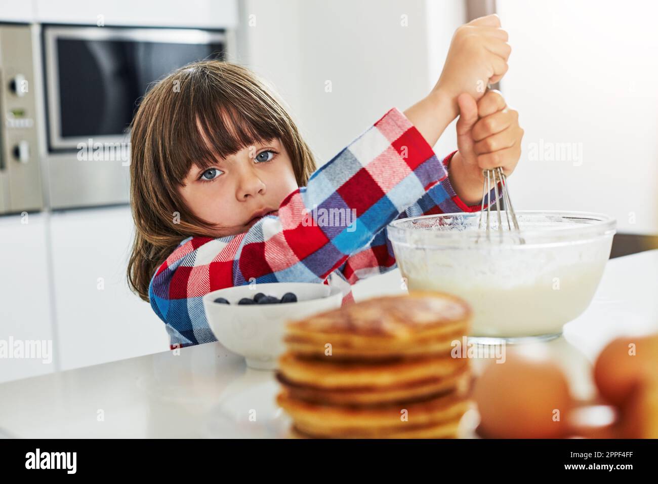 The mixture has to be smooth and lump free. an adorable little boy ...
