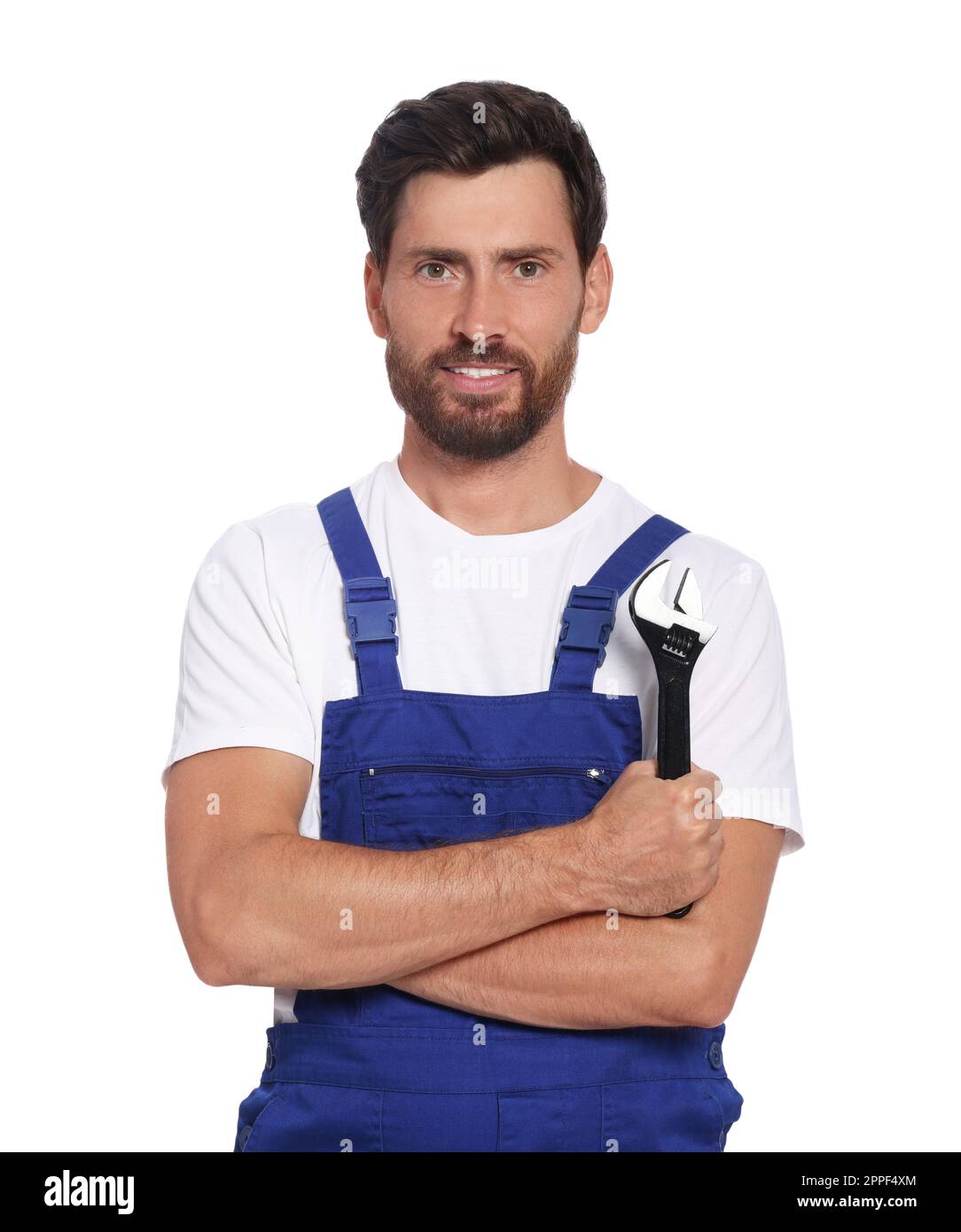 Professional plumber with adjustable wrench on white background Stock ...