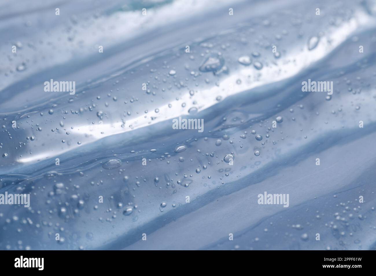 Light blue liquid texture face hi-res stock photography and images - Alamy