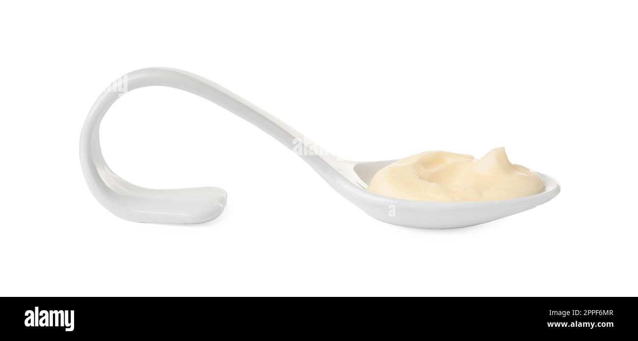 Mayonnaise in ceramic serving spoon isolated on white Stock Photo - Alamy