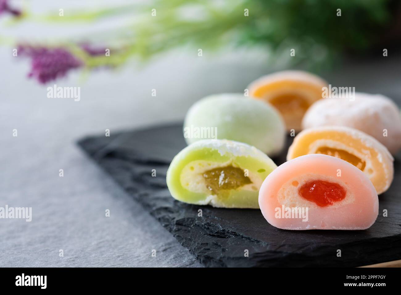 Japanese colorful mochi on gray stone surface Stock Photo - Alamy