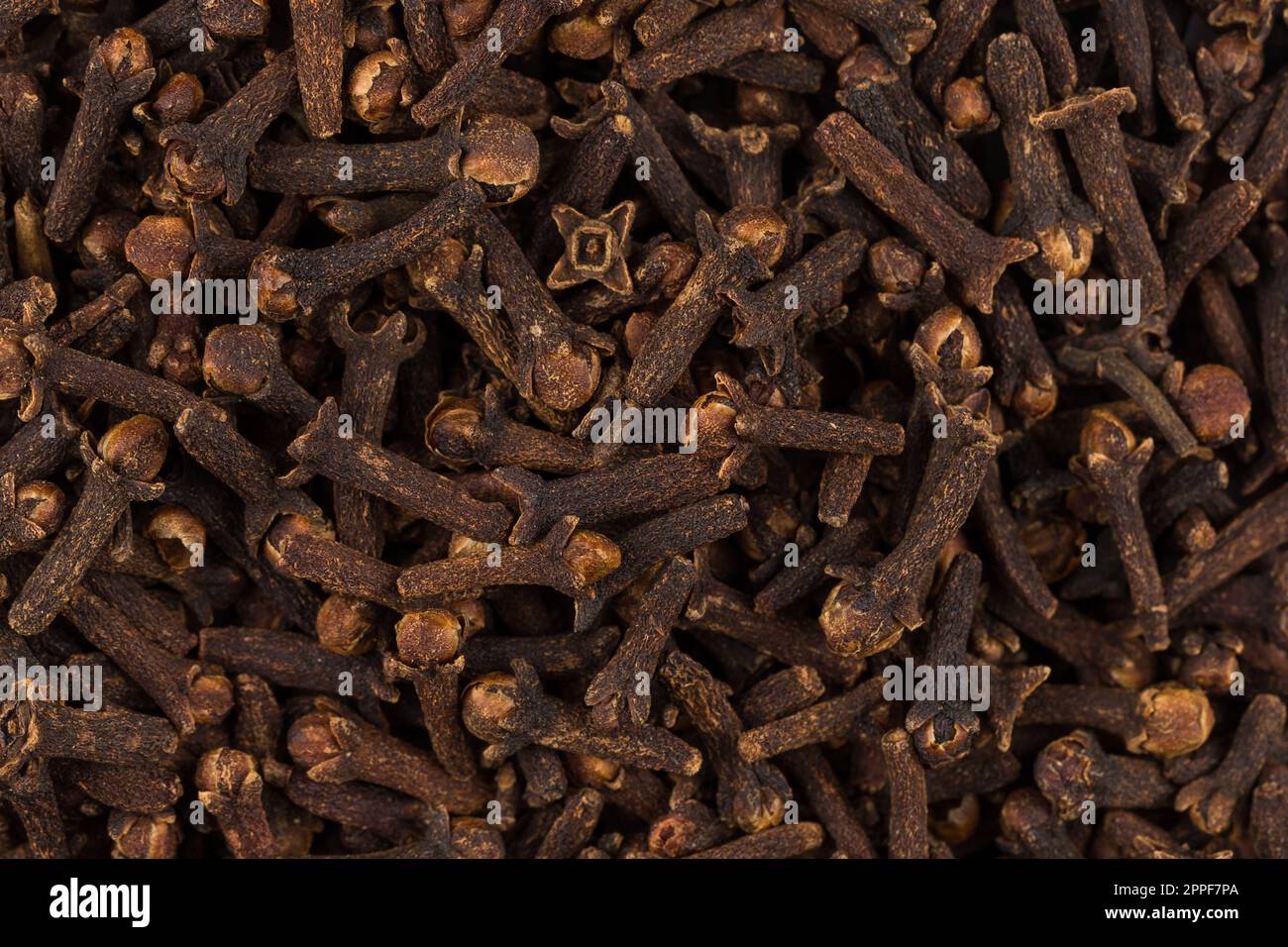 Cloves spice close up as a background Stock Photo - Alamy