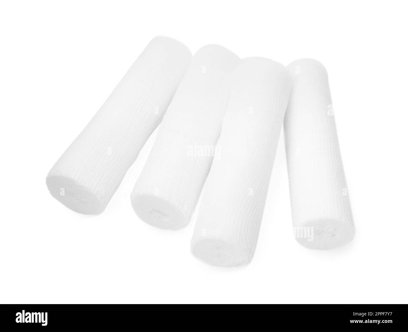 Many medical bandage rolls on white background Stock Photo - Alamy