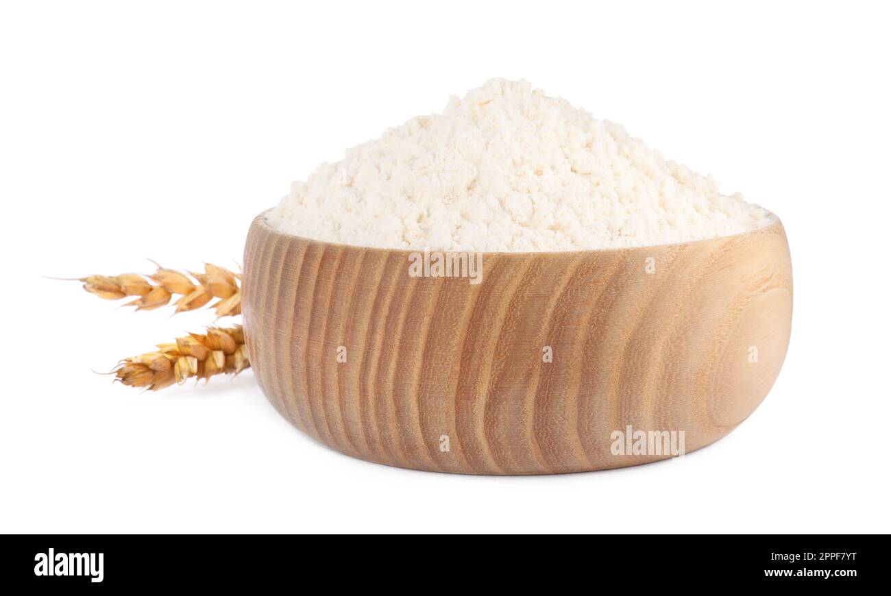 Wooden bowl with wheat flour on white background Stock Photo - Alamy