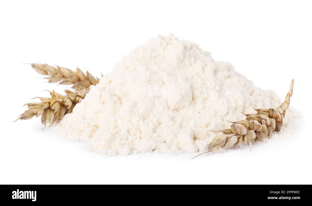 Pile of wheat flour and spikes isolated on white Stock Photo - Alamy