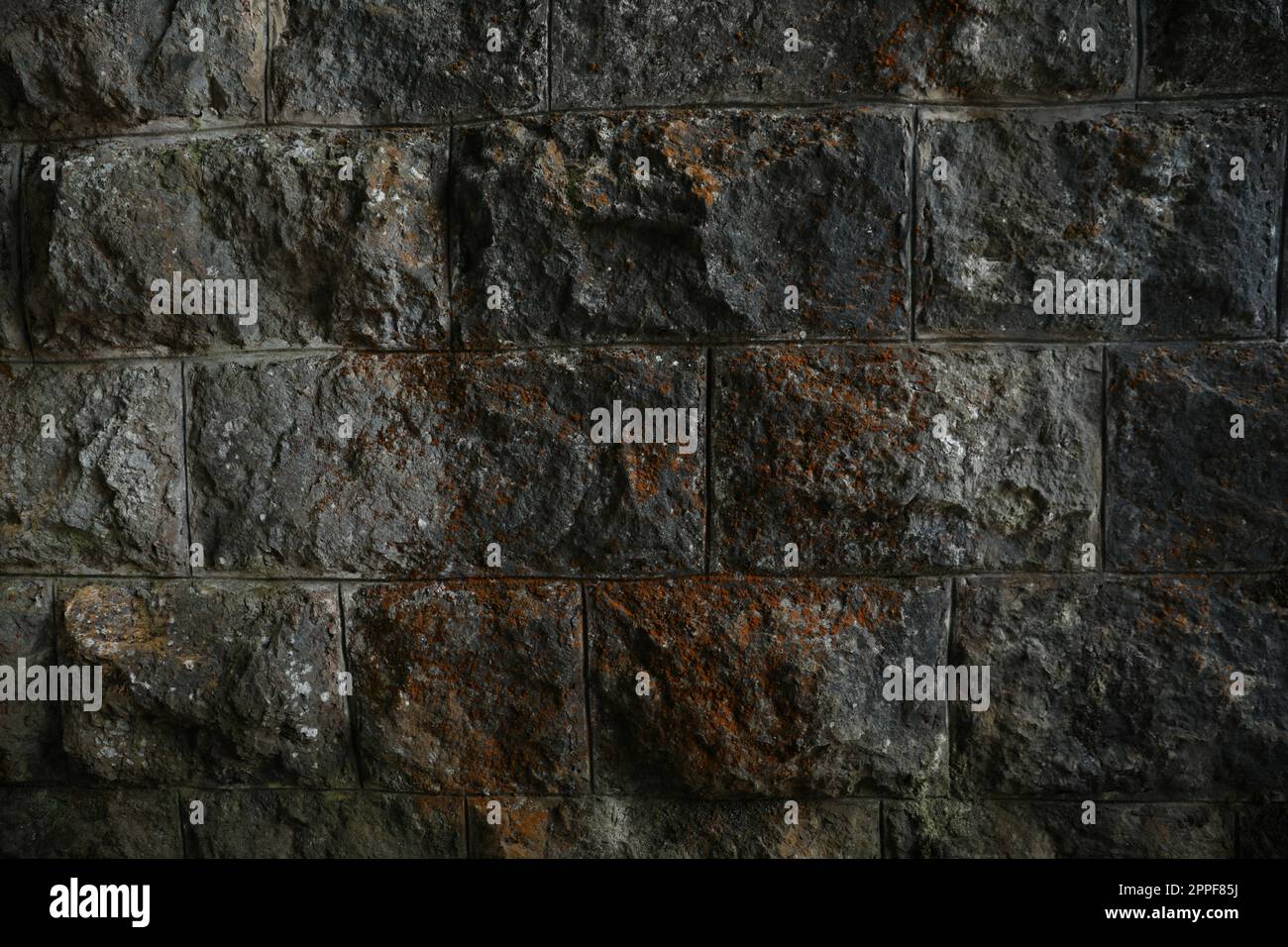 Texture of dark stone wall as background, closeup Stock Photo - Alamy