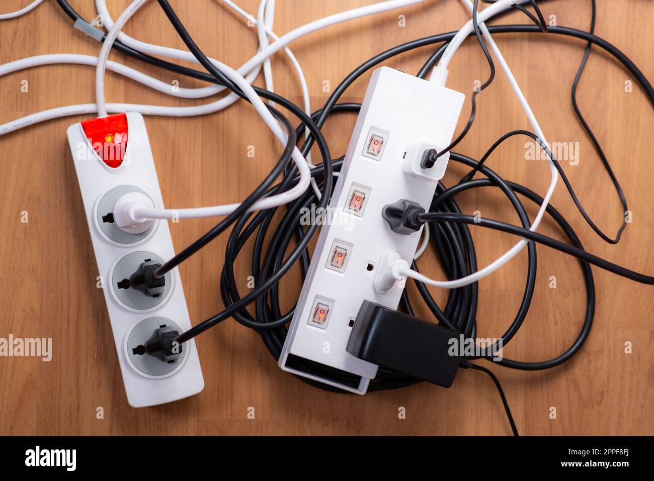 Many plugs connected to the power strip with individual switches Stock ...