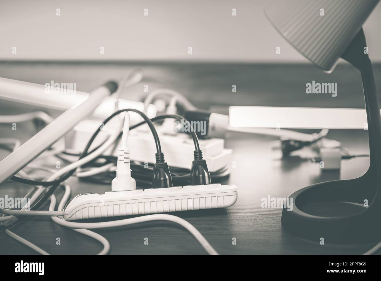 Many plugs connected to the power strip with individual switches Stock ...