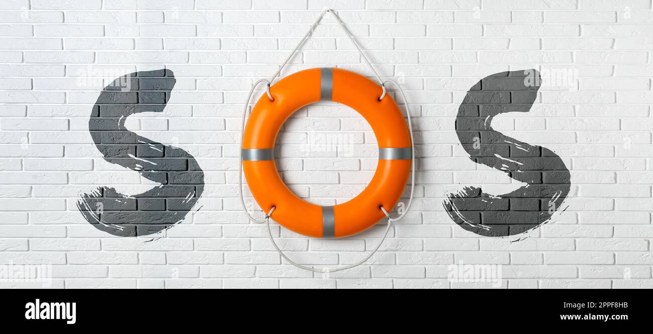 SOS message made from lifebuoy and letters on white brick wall. Banner ...