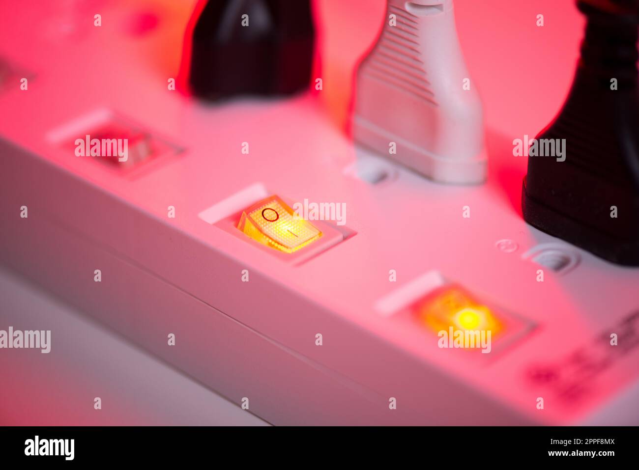 Many plugs connected to the power strip with individual switches Stock ...