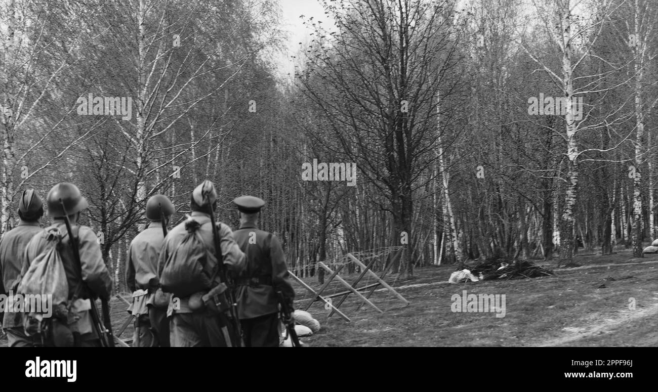 Group Of Re-enactors Dressed As Soviet Russian Soldiers Escort ...